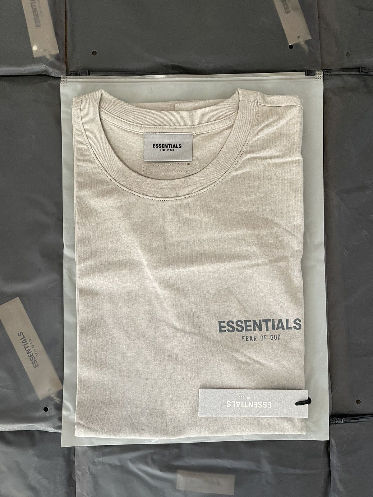 Pacsun FOG - Essentials Fear Of God Tan Logo-Print Jersey T-Shirt | Grailed