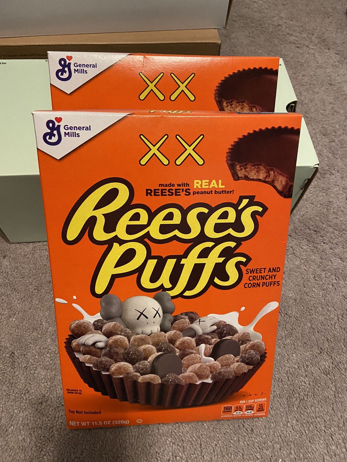 Kaws KAWS x Reese’s puffs cereal bundle | Grailed