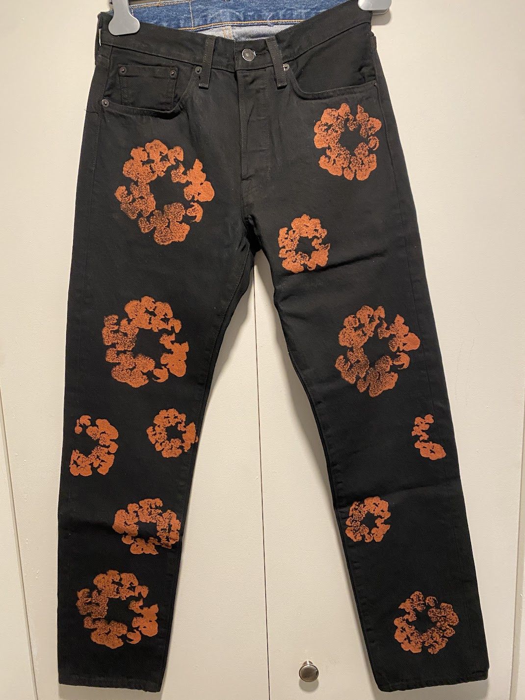 Levi's Denim Tears Levi's Cotton Wreath Jeans Black/Red Clay | Grailed
