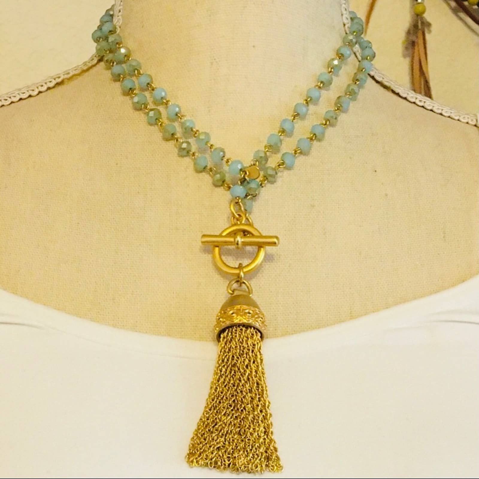 Jewelry Matte gold tone tassel antique blue bead necklace | Grailed