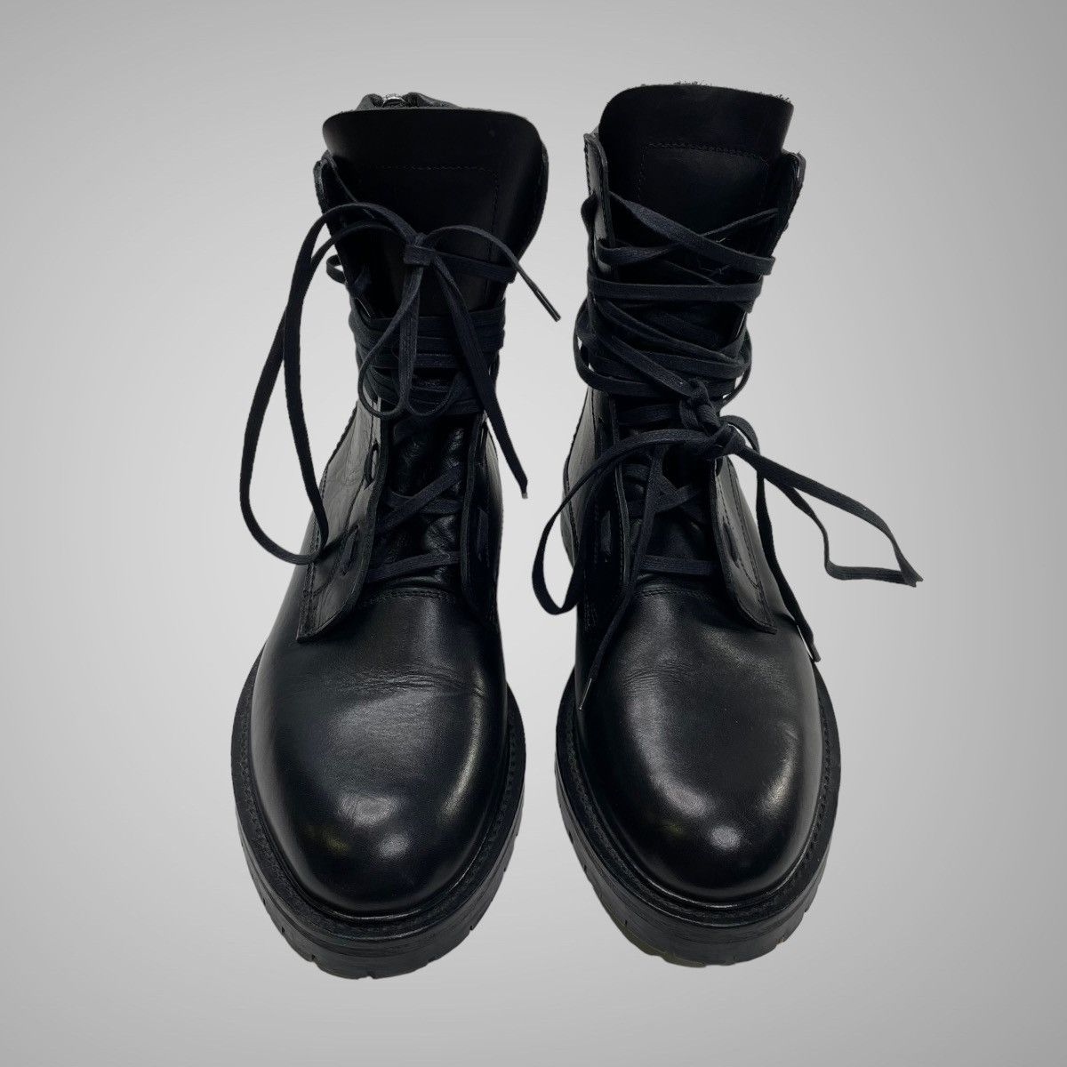 Amiri Amiri black leather wraparound combat boots | Grailed