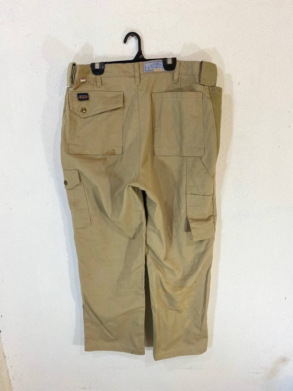 Vintage Skillers cargo pants distressed style with paint splatter | Grailed