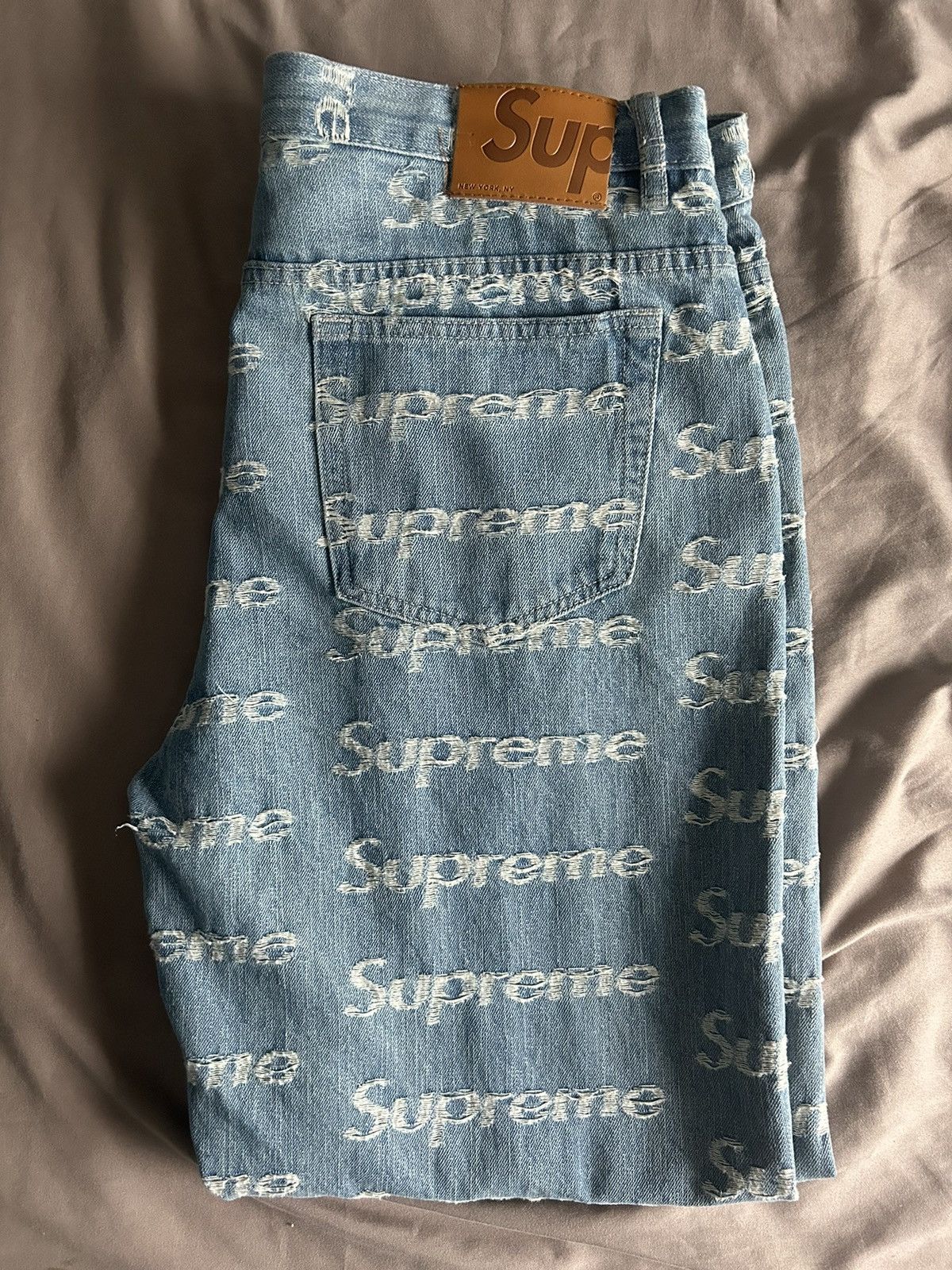 Supreme “Supreme” print Cotton Jeans | Grailed