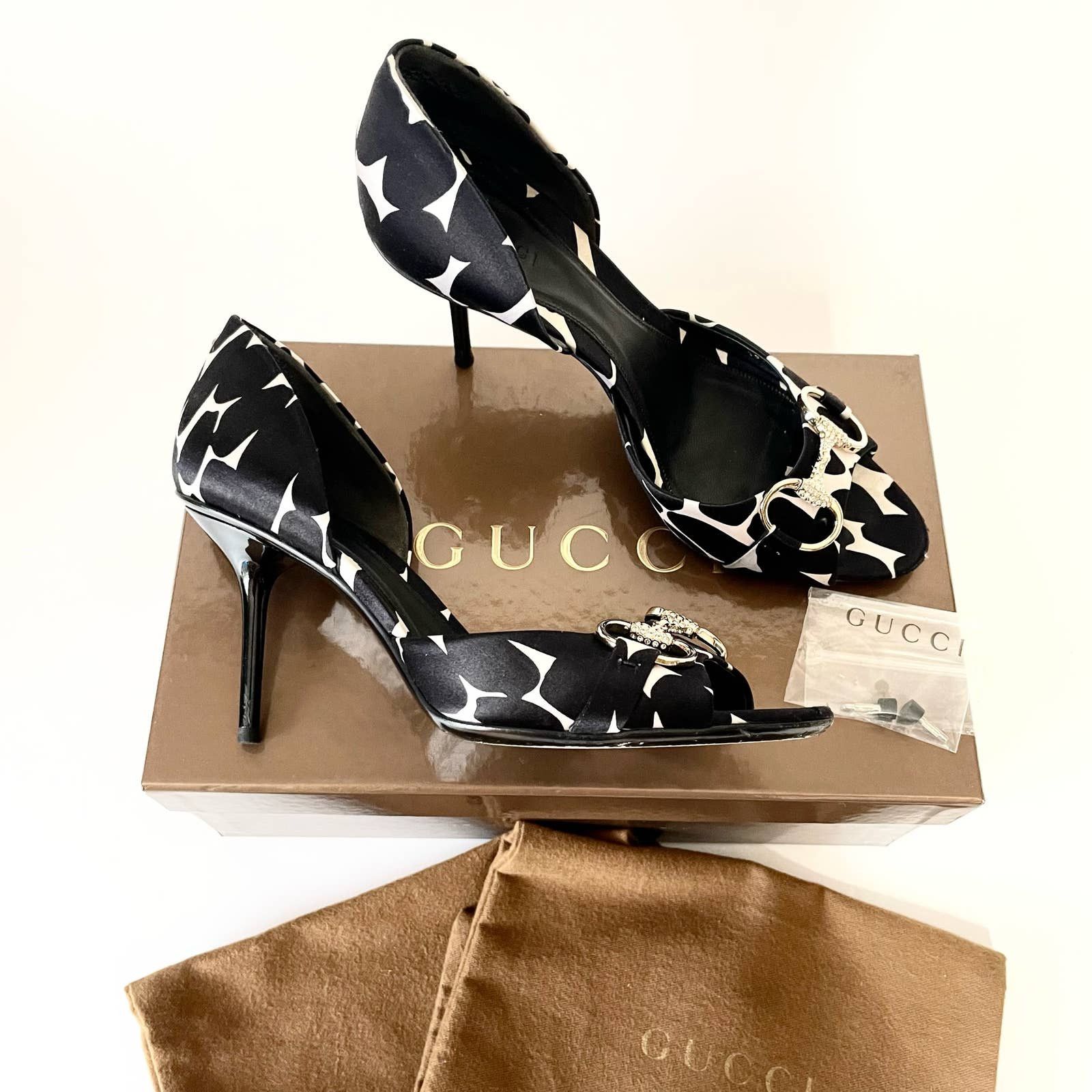 Gucci Gucci Cow Print Horsebit D'Orsay Pumps Black White Satin | Grailed