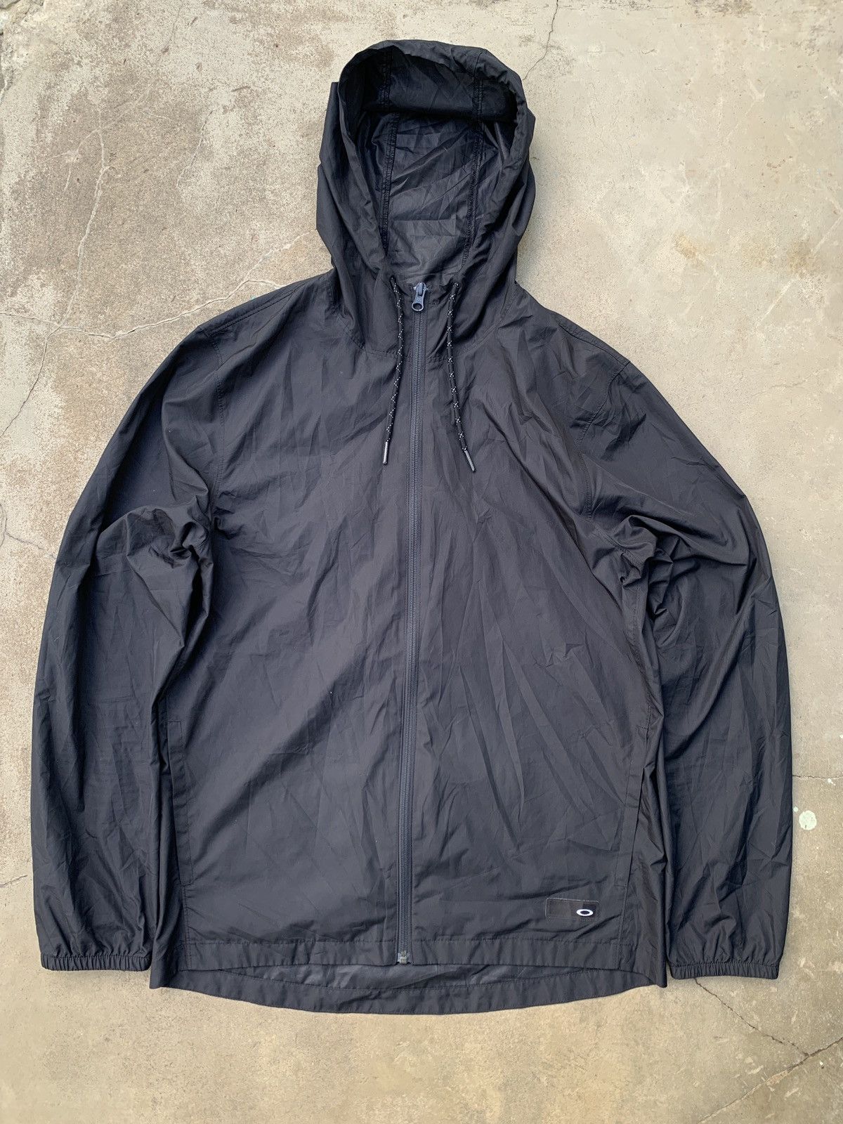 Oakley × Streetwear vtg OAKLEY HOODED WINDBREAKER LIGHT JACKET GORPCORE ...