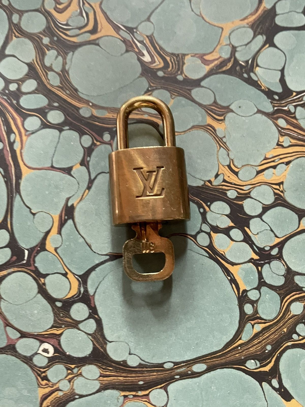 Louis Vuitton Louis Vuitton Lock | Grailed
