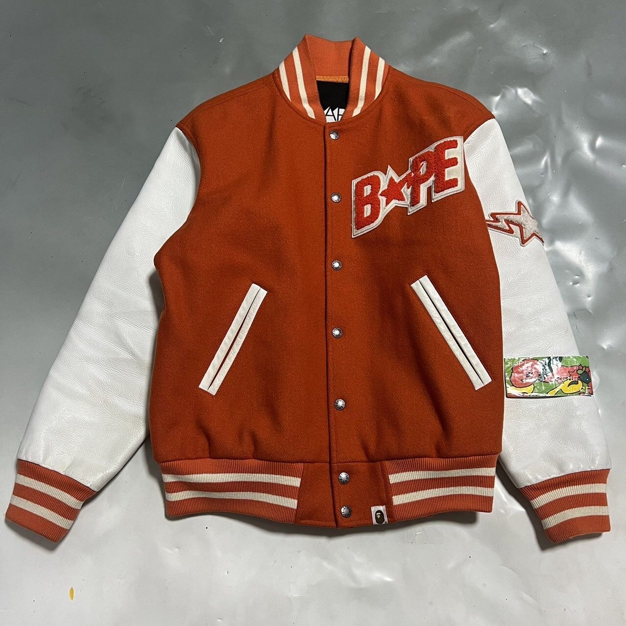 Bape very very rare BAPE versity jacket orange/White | Grailed