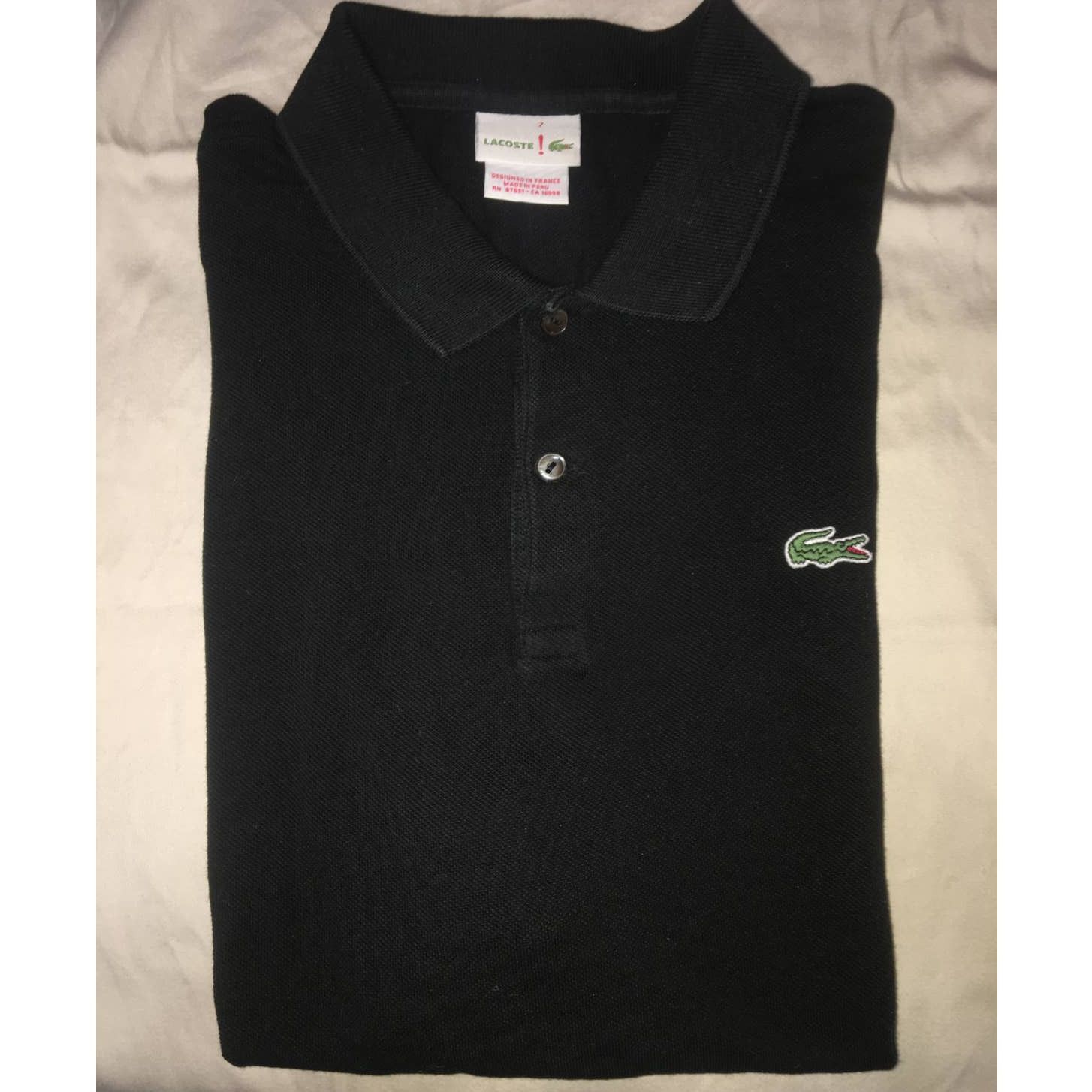 Lacoste Vintage? Lacoste Size 7/XXL Black Polo Made in Peru | Grailed