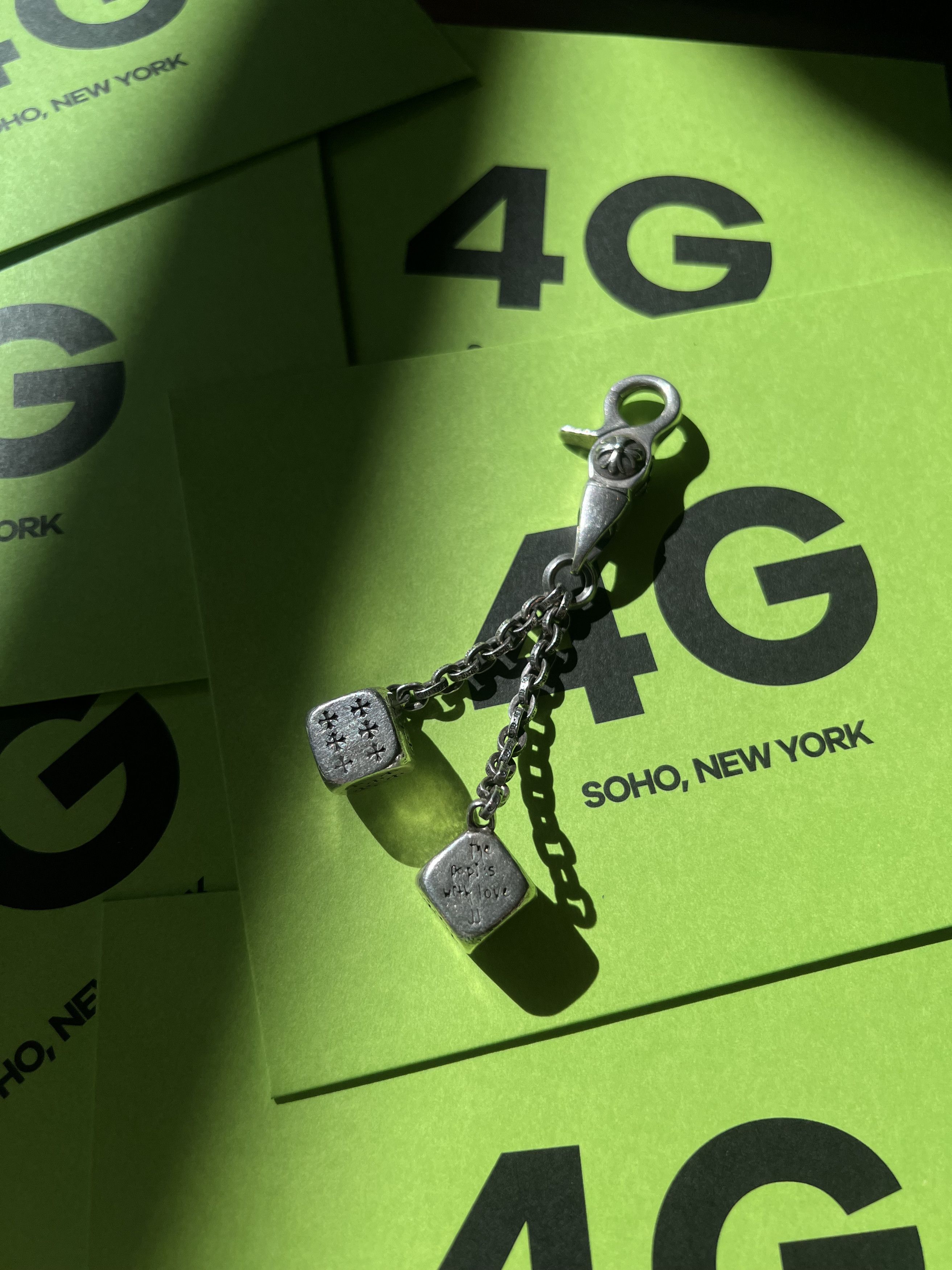 Chrome Hearts Chrome Hearts paper chain dice keychain | Grailed