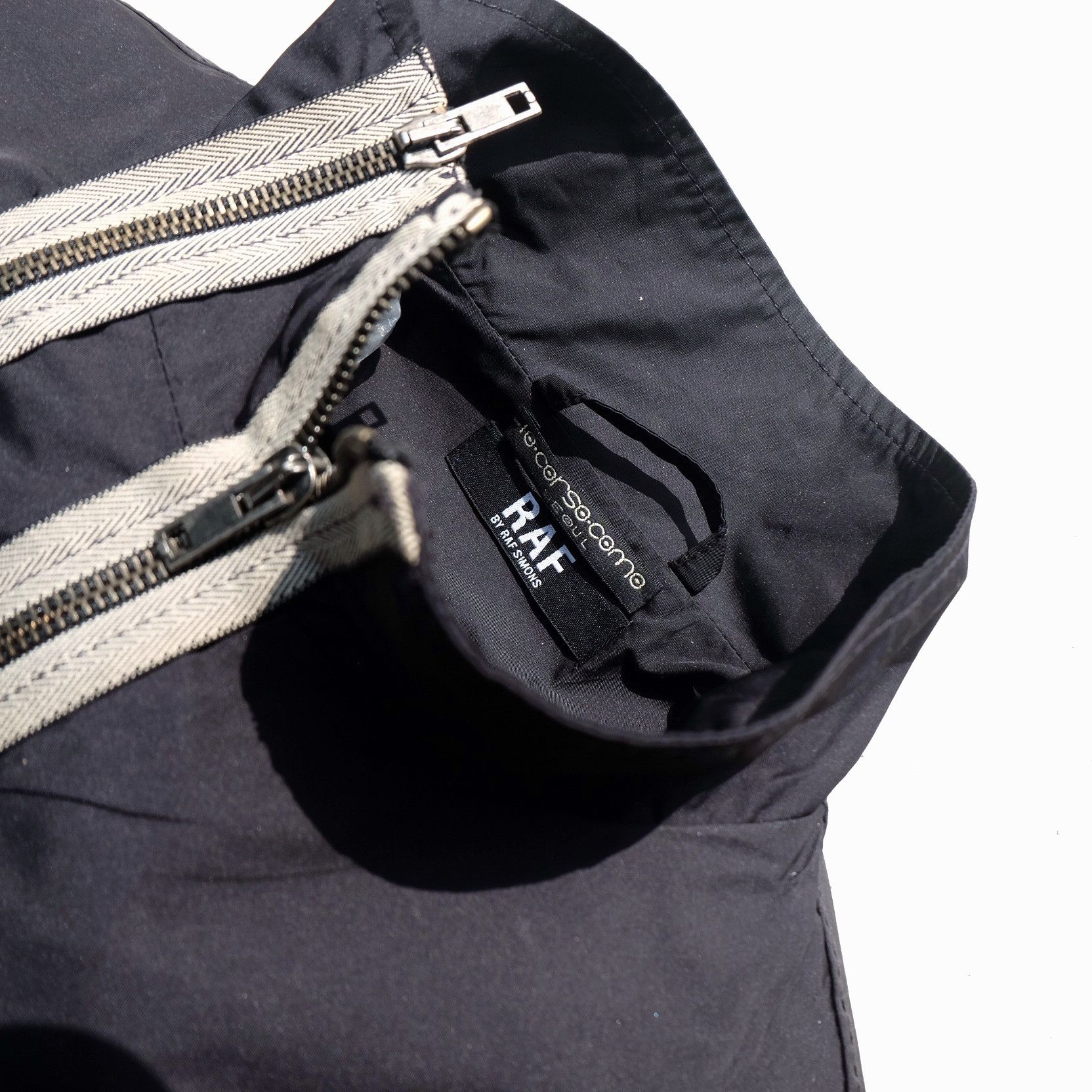 Raf Simons × Raf by Raf Simons RAF Dual fabric asymmetrical zip bomber ...