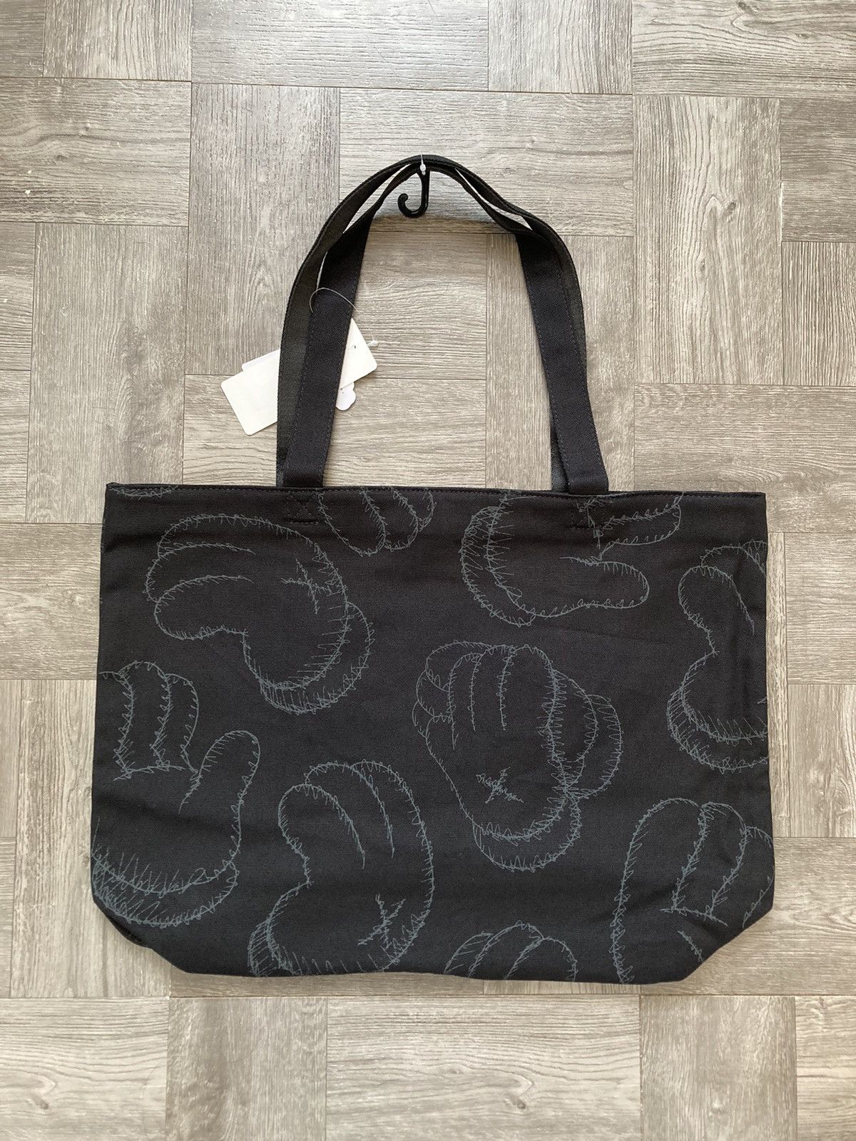 Kaws × Uniqlo Uniqlo x Kaws Hands Tote Bag Black | Grailed