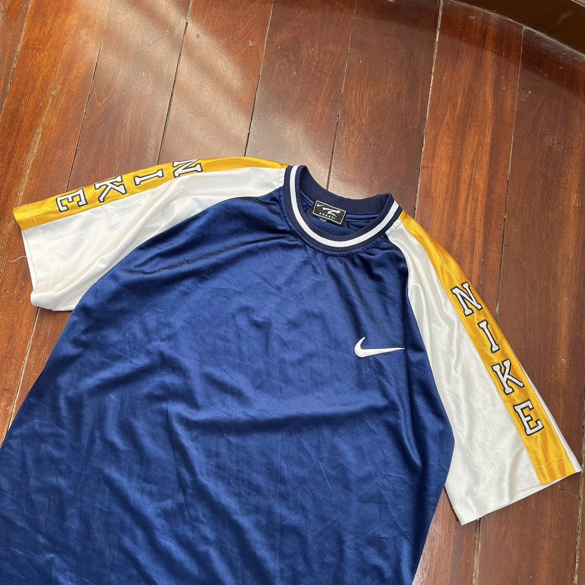 Nike Rare Vintage Nike Agassi Spell Out 90s Jersey | Grailed