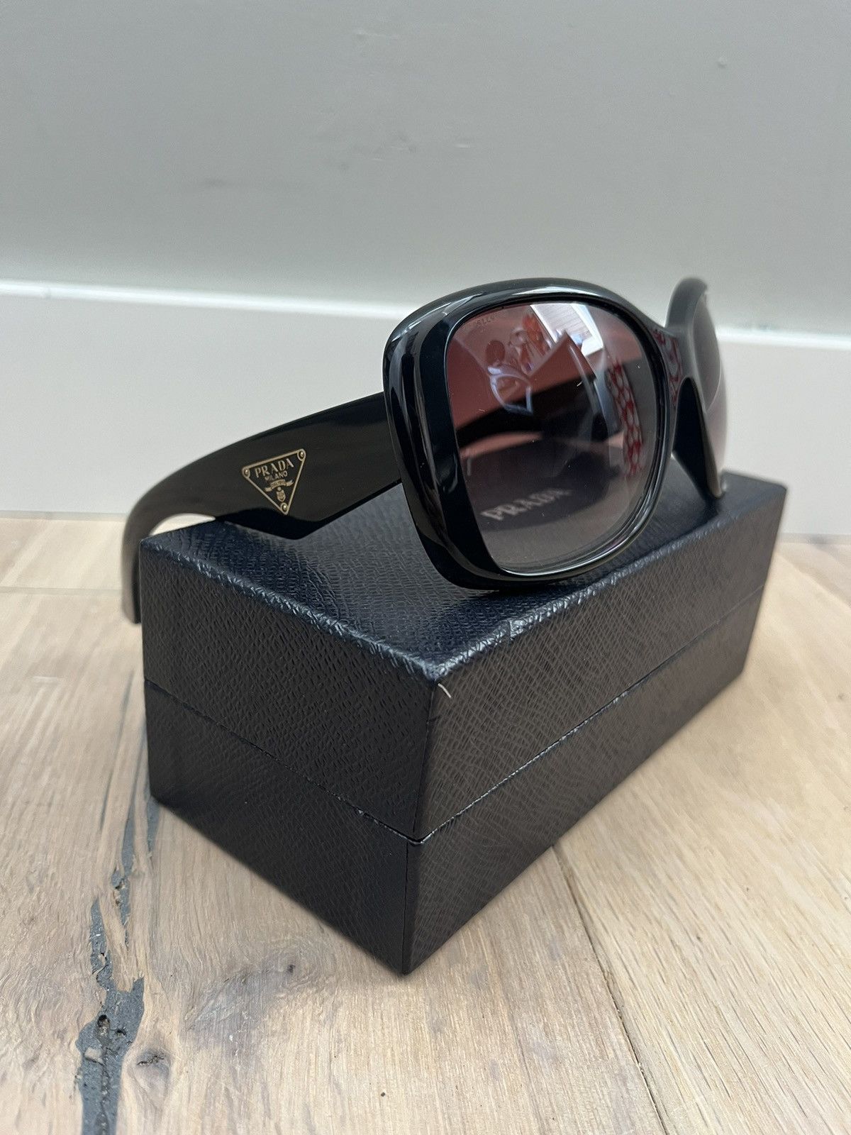 Prada Prada Triangle Logo Mask Black Sunglasses | Grailed