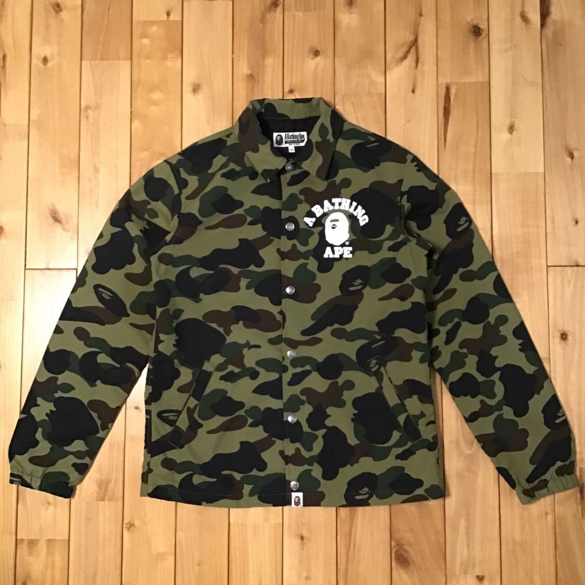 Bape BAPE College logo coach jacket 1st camo green | Grailed