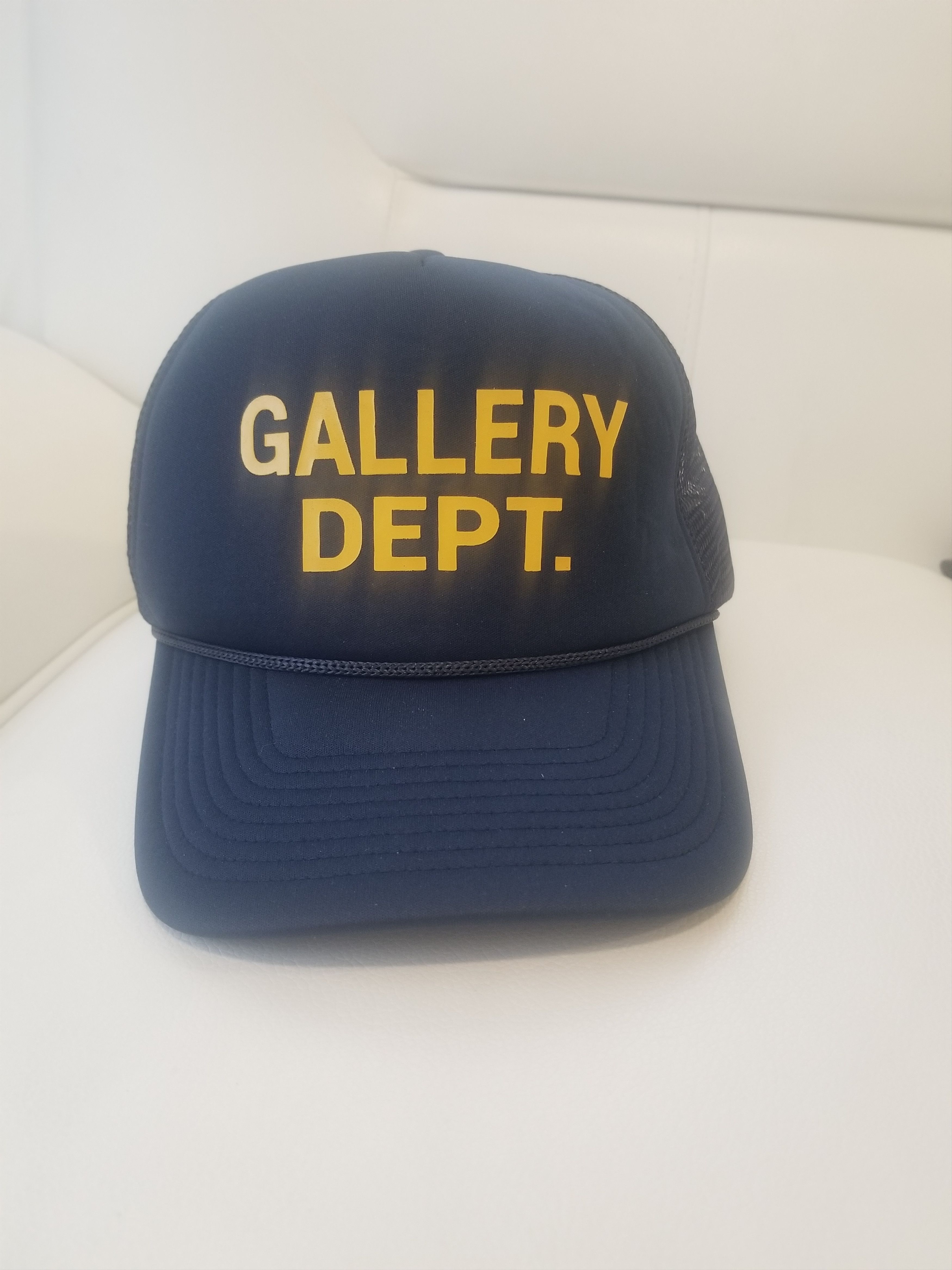 Gallery Dept. Gallery department navy blue/yellow trucker hat | Grailed