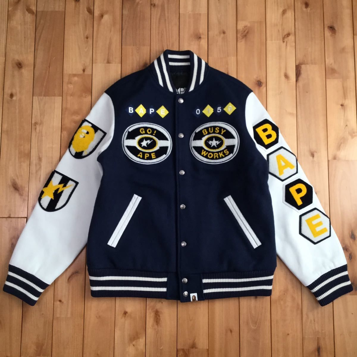 Bape BAPE Sleeve leather BAPE LOGO varsity jacket navy | Grailed