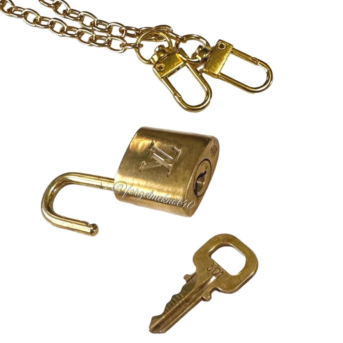 Louis Vuitton Louis Vuitton LV Lock & Key #301 with Chain | Grailed