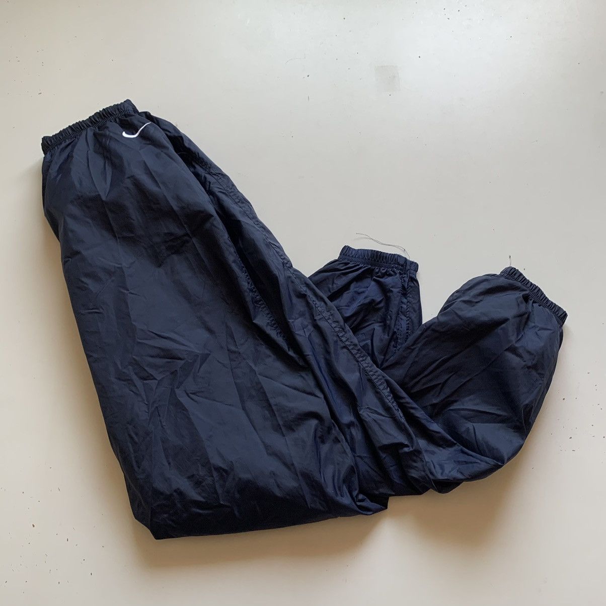 Nike × Vintage Vintage 90s Nike embroidered swoosh track pants navy ...