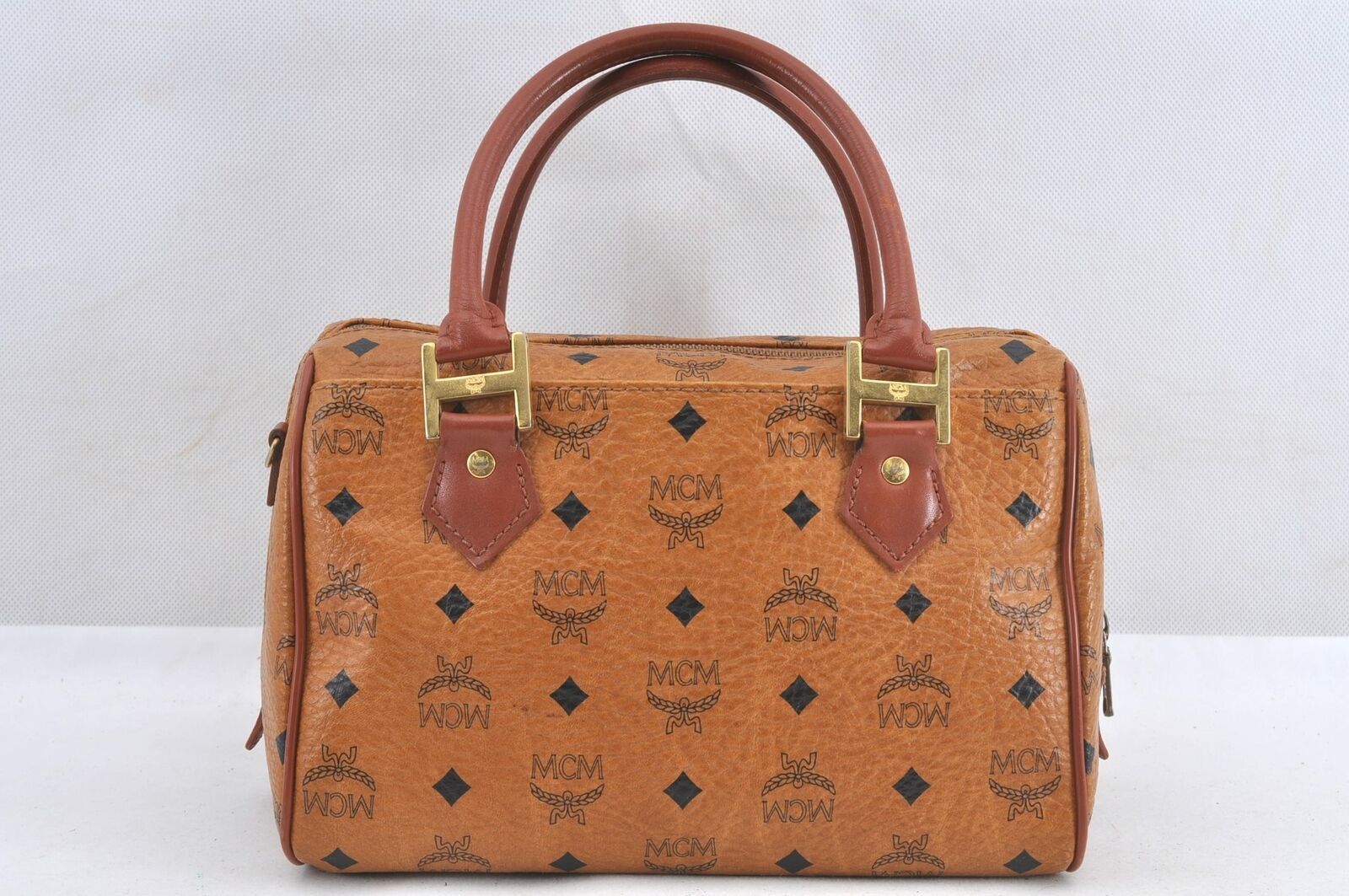 MCM Monogram Mini Hand Bag | Grailed