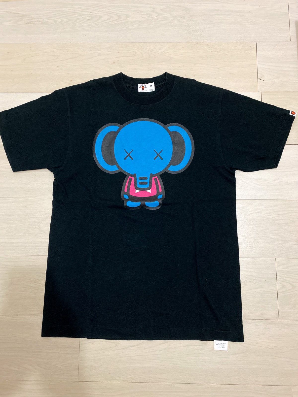 Bape × Kaws Bape x Kaws Baby Milo Elephant Tee | Grailed