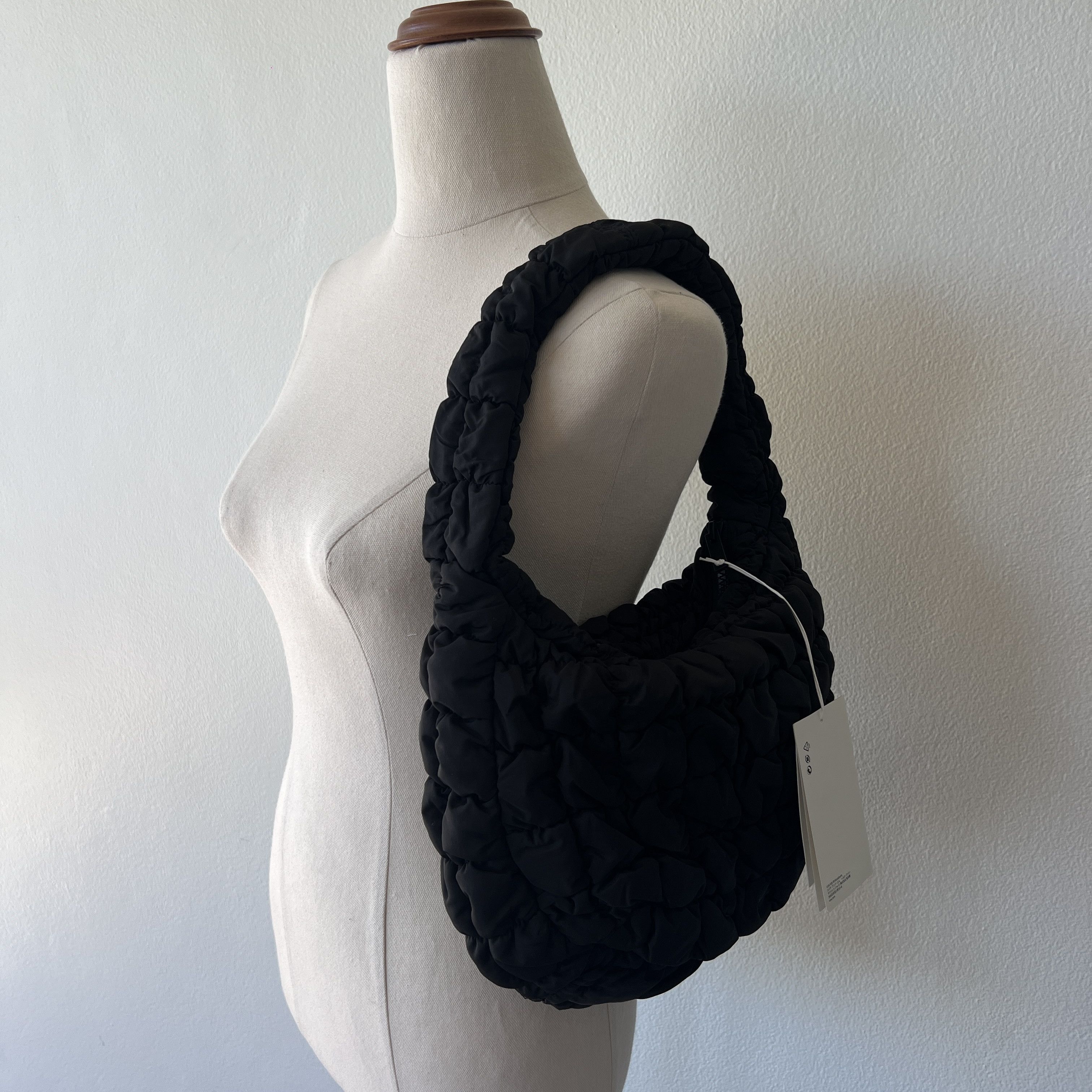 Cos Black quilted cloud mini shoulder bag | Grailed