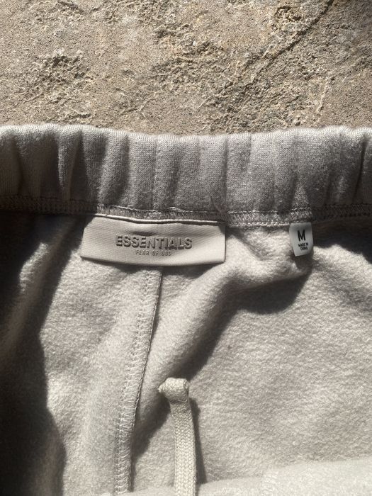 Fear of God Essentials cuffed sweatpants | Grailed