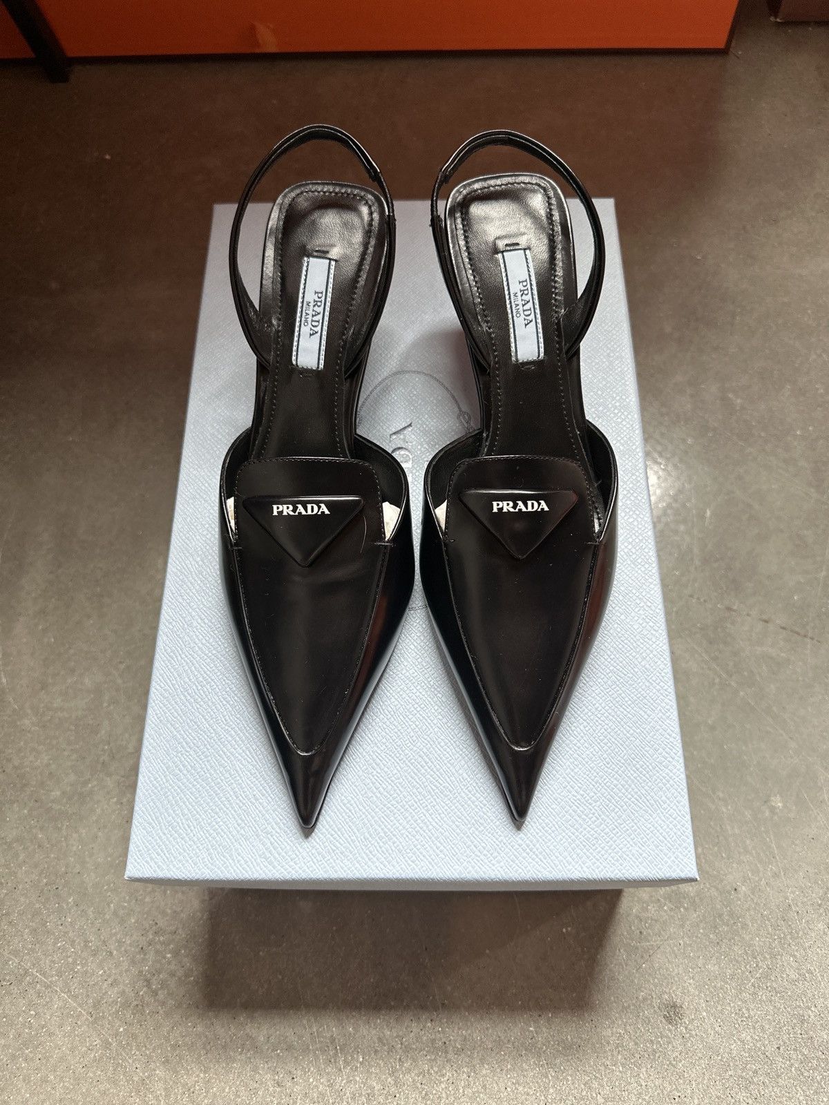 Prada Prada Logo Plaque Point Toe Slingback Pumps | Grailed