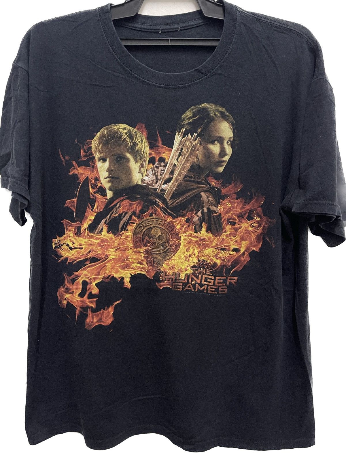 Movie the hunger games promo shirt | Grailed