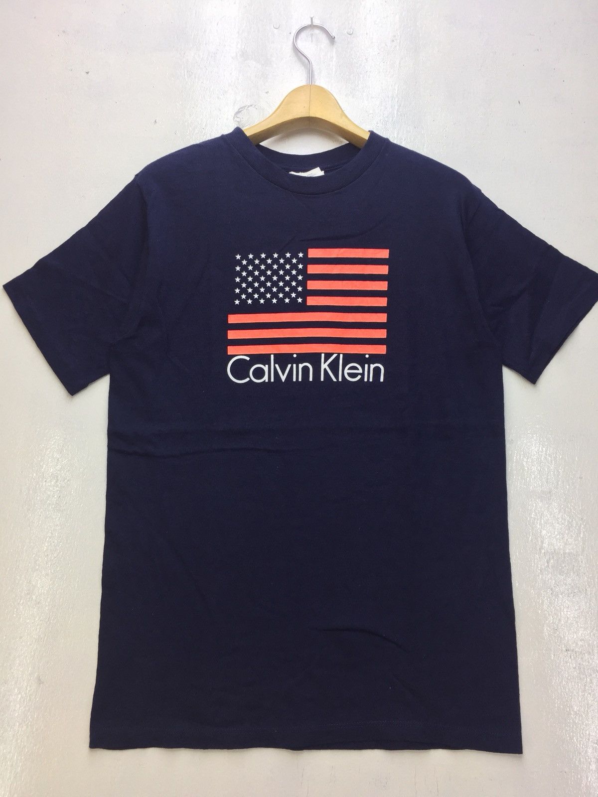 Calvin Klein × Vintage Vintage Calvin Klein American Flag Logo Shirt ...