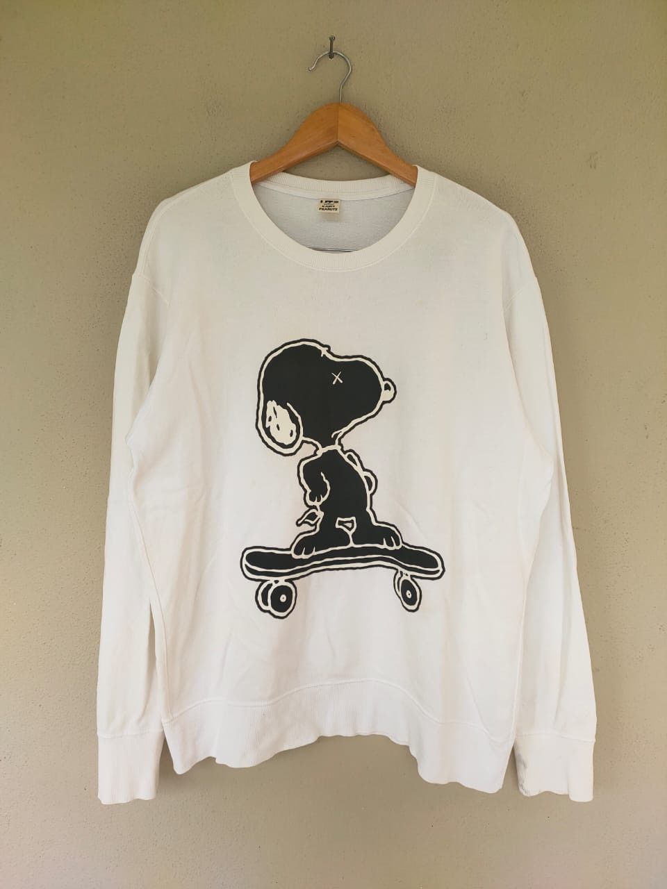 Uniqlo 💥LAST CALL💥 Kaws Snoopy Crew neck | Grailed