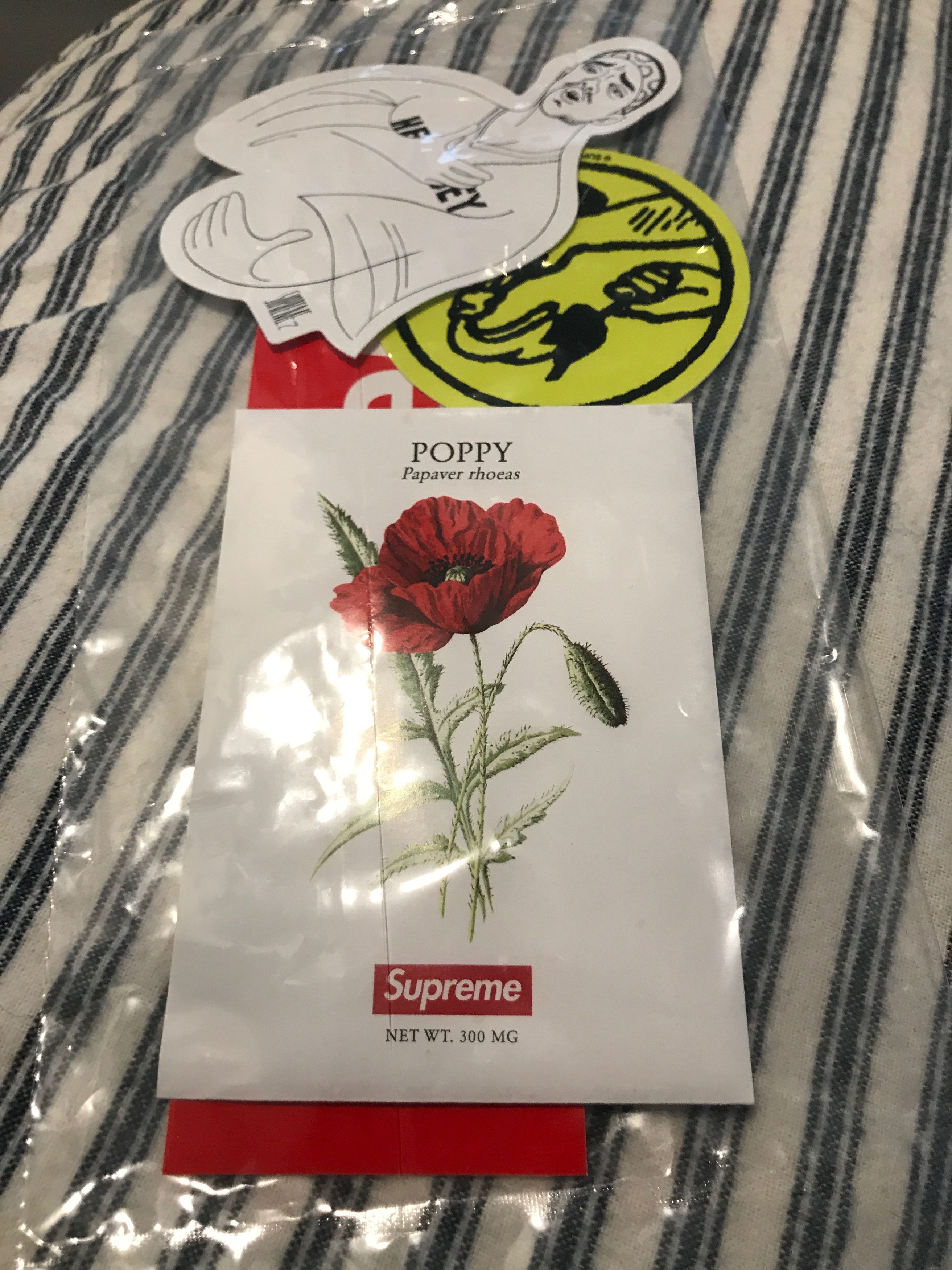Supreme Poppy seeds and sticker pack | Grailed