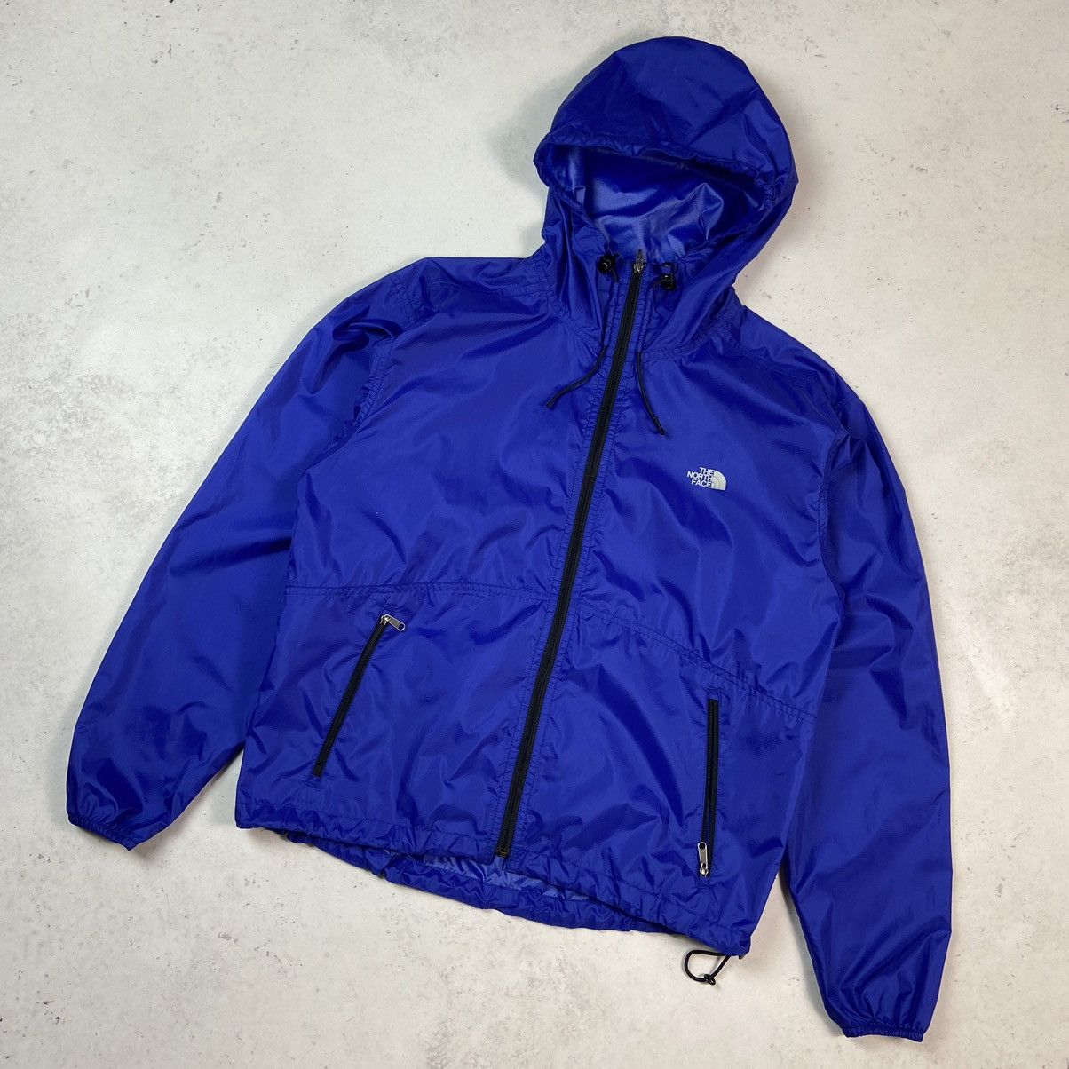 Vintage 90s Vintage The North Face Stow Pocket Light Rain Jacket | Grailed