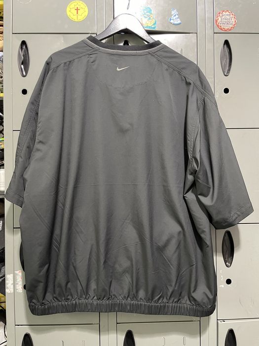 Nike Vintage Nike Gold Center swoosh back v neck windbreaker tee | Grailed