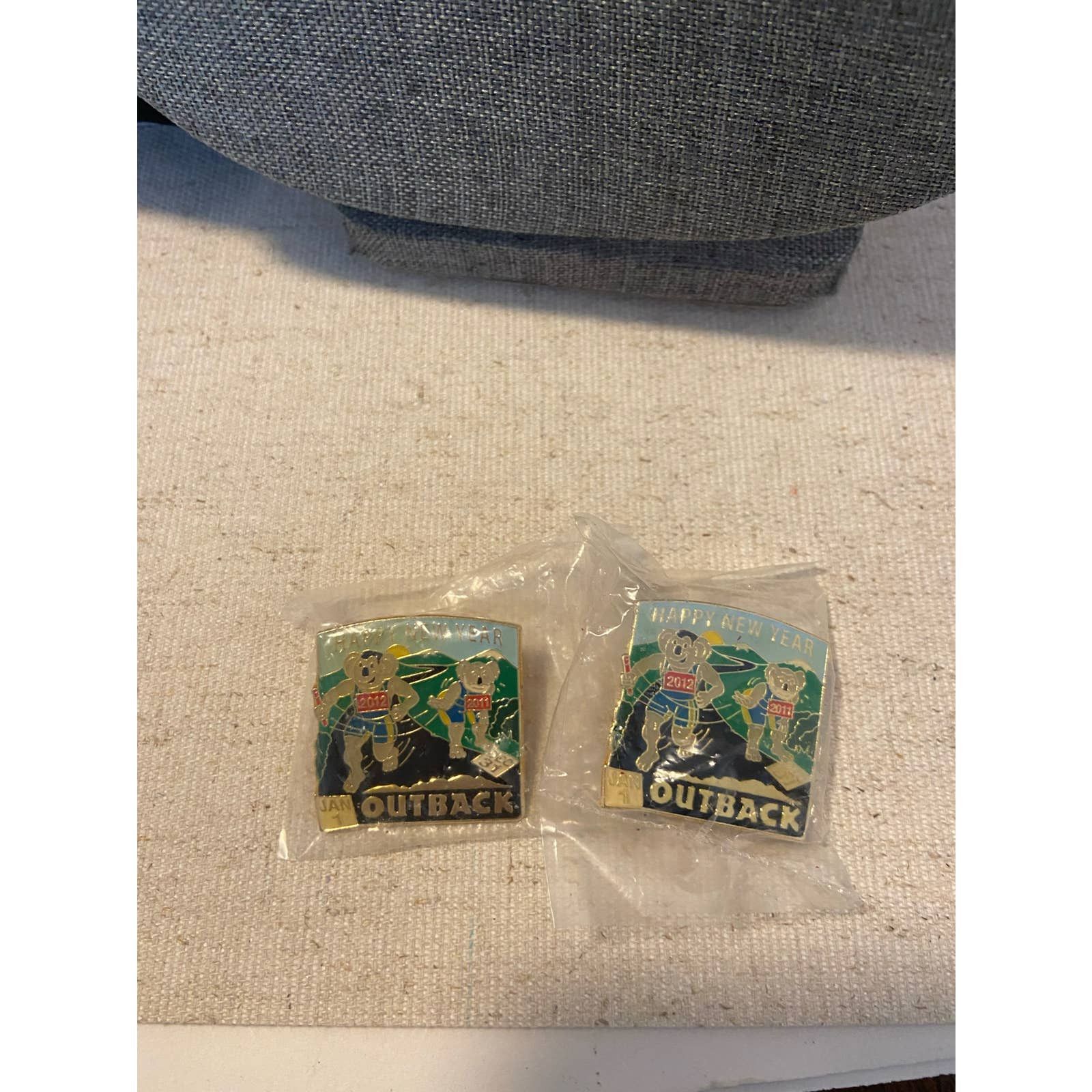 Generic Rare Outback Steakhouse New Years pin 2011 | Grailed