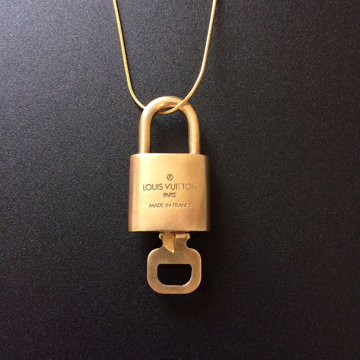 Louis Vuitton LV Lock & Gold Chain | Grailed