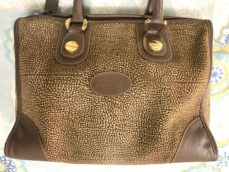 Vintage Vintage Borbonese by red wall, brown and beige leather classic ...