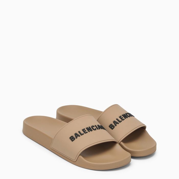 Balenciaga Balenciaga Beige Rubber Slide Sandals | Grailed