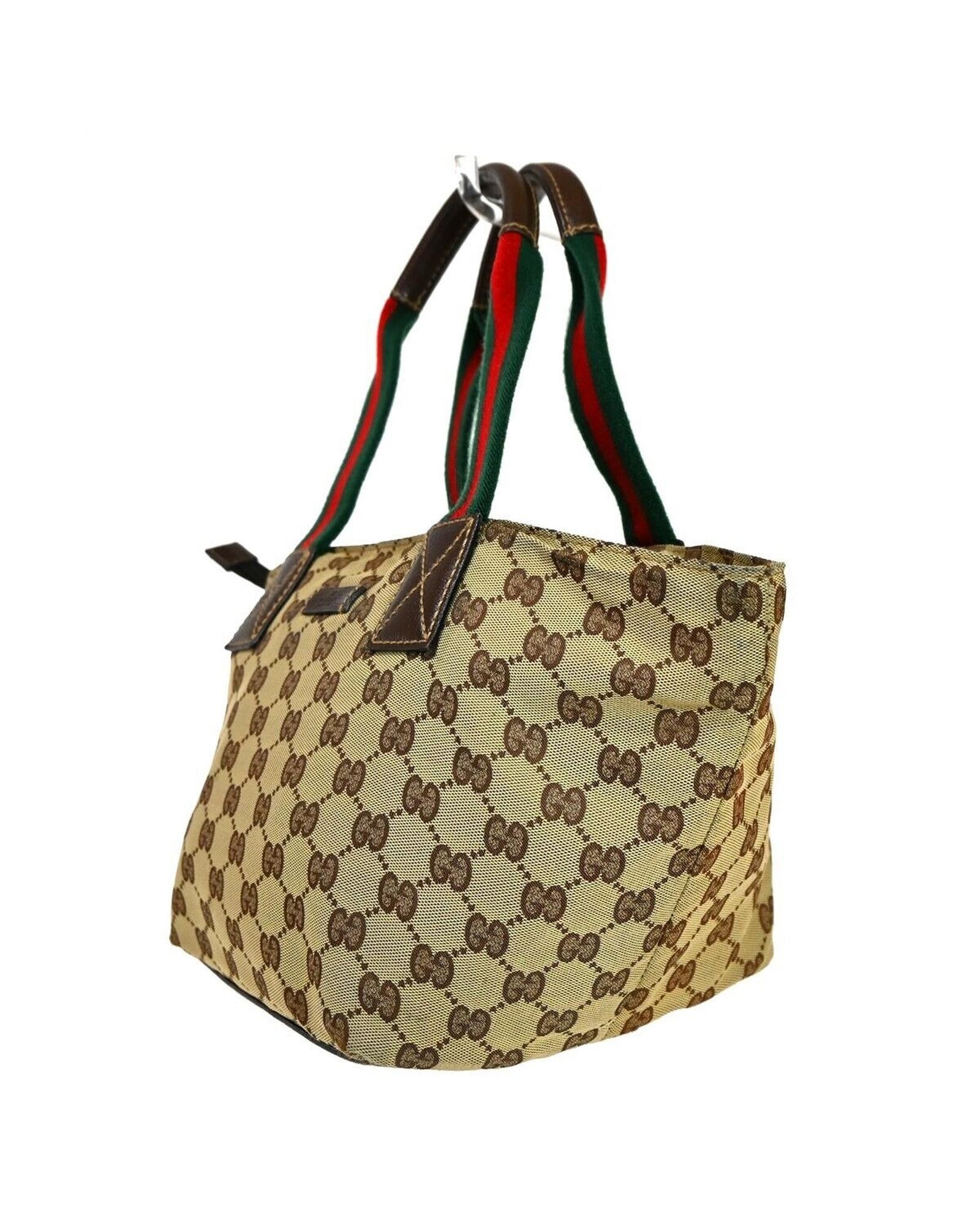 Gucci Beige Canvas Trapezoid Handbag with Signature Pattern | Grailed