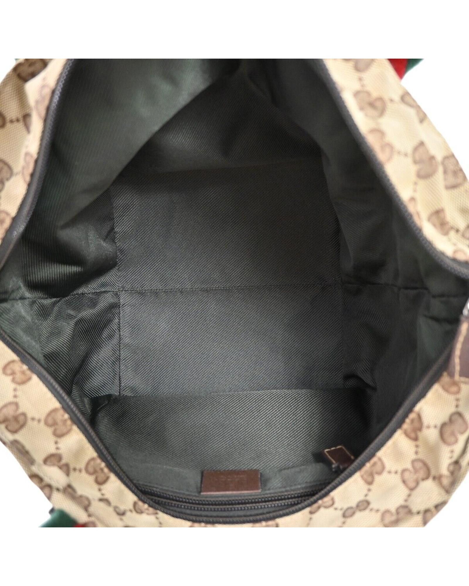 Gucci Beige Canvas Trapezoid Handbag with Signature Pattern | Grailed