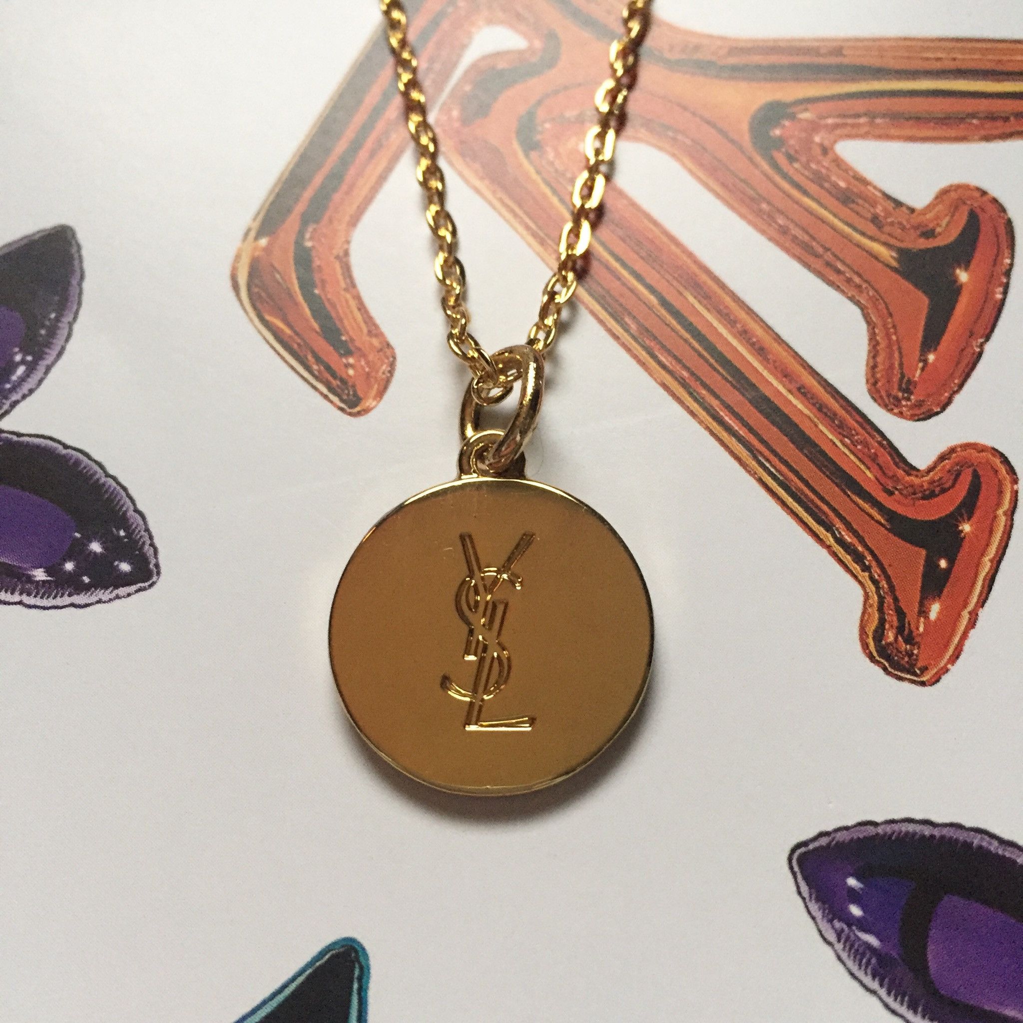 Yves Saint Laurent Gold YSL Circle Logo Pendant Necklace | Grailed