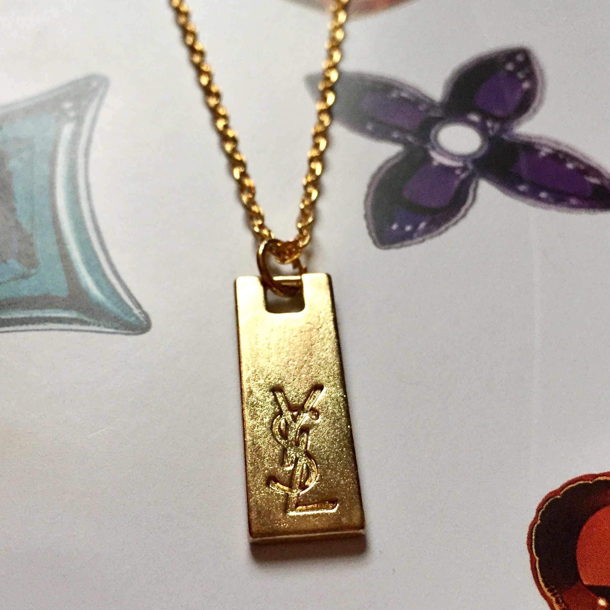 Yves Saint Laurent Gold YSL Pendant Necklace | Grailed