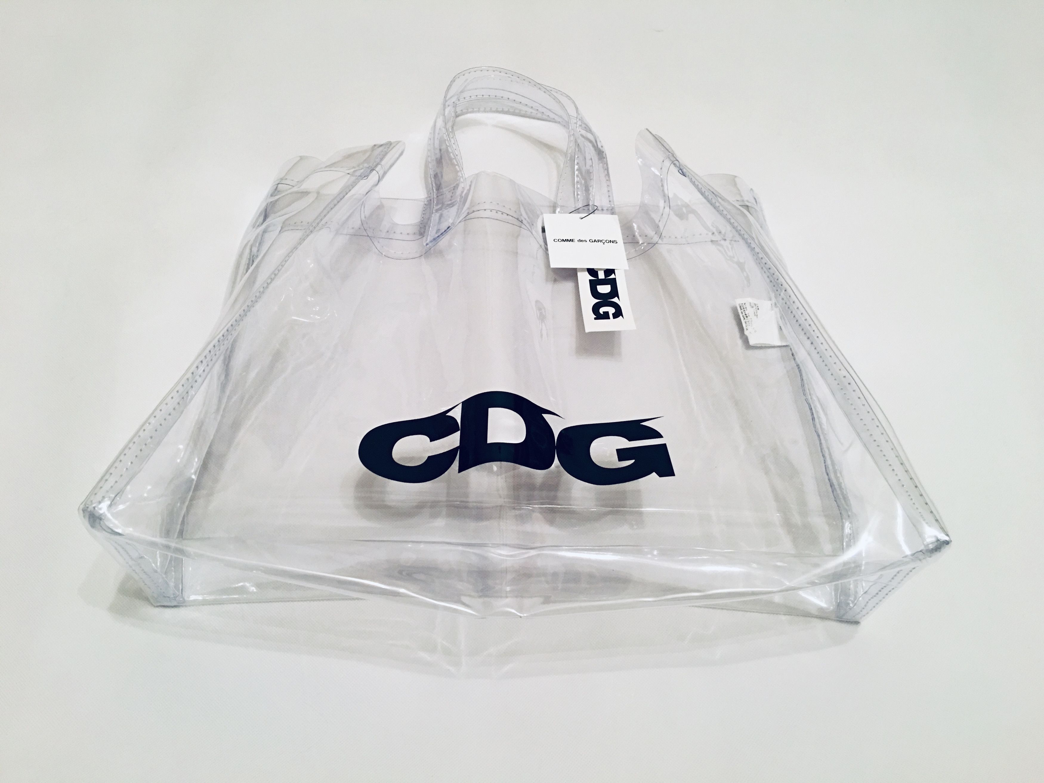 Comme des Garcons × Rei Kawakubo Comme des Garcons CDG Logo Transparent ...