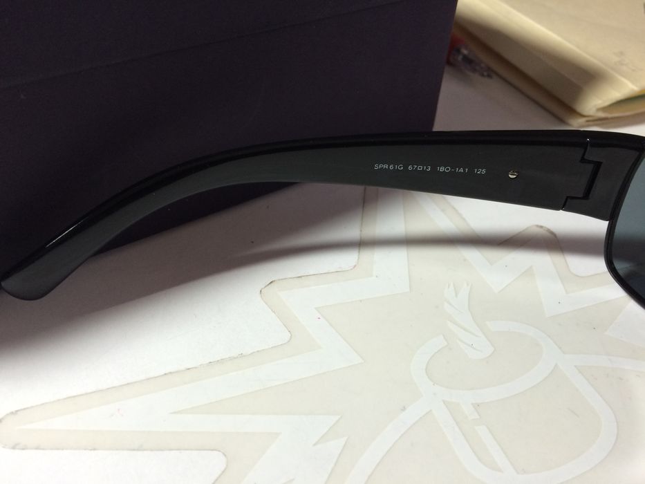 Prada 32021 Agordo (BL) Sunglasses | Grailed