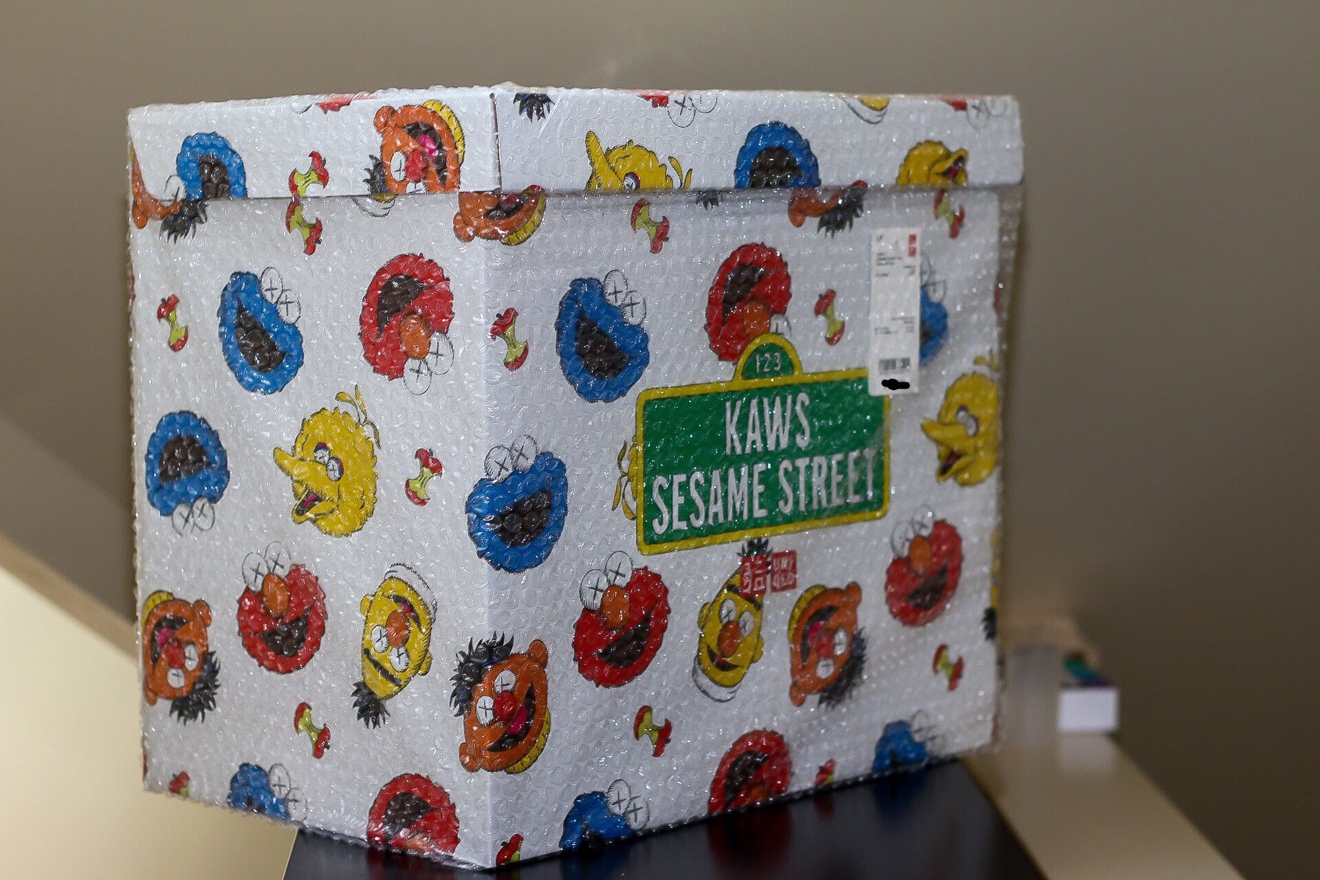 Kaws × Uniqlo KAWS x Sesame Street Box Set | Grailed