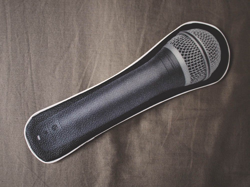 Undercover photo print leather pouch - "mic" | Grailed