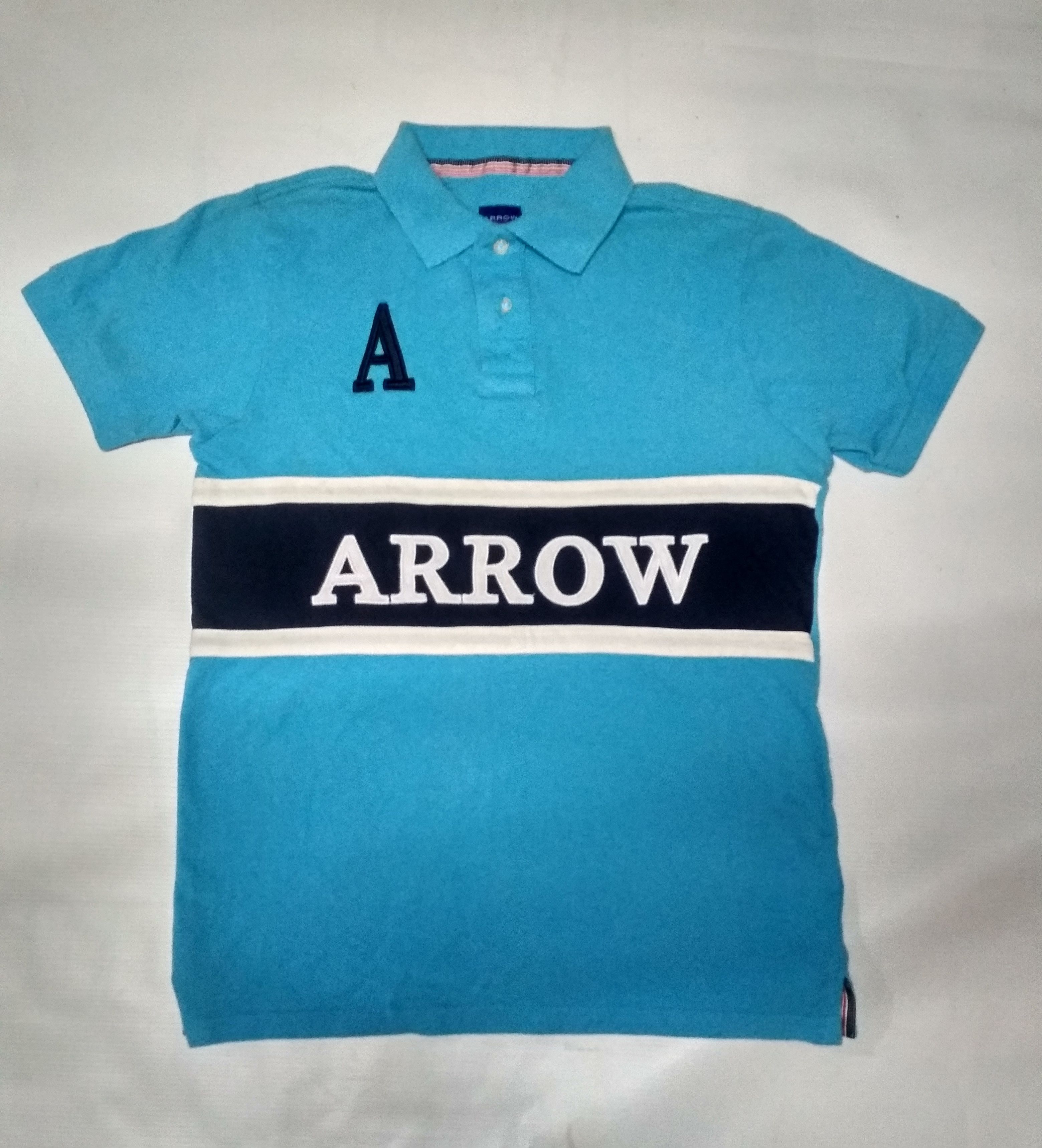 Arrow Polo t shirt | Grailed