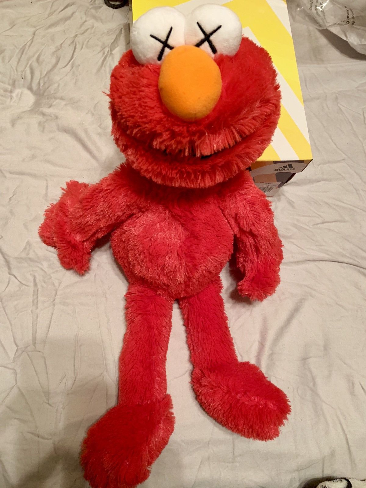Kaws × Uniqlo Uniqlo x KAWS Elmo Plush | Grailed