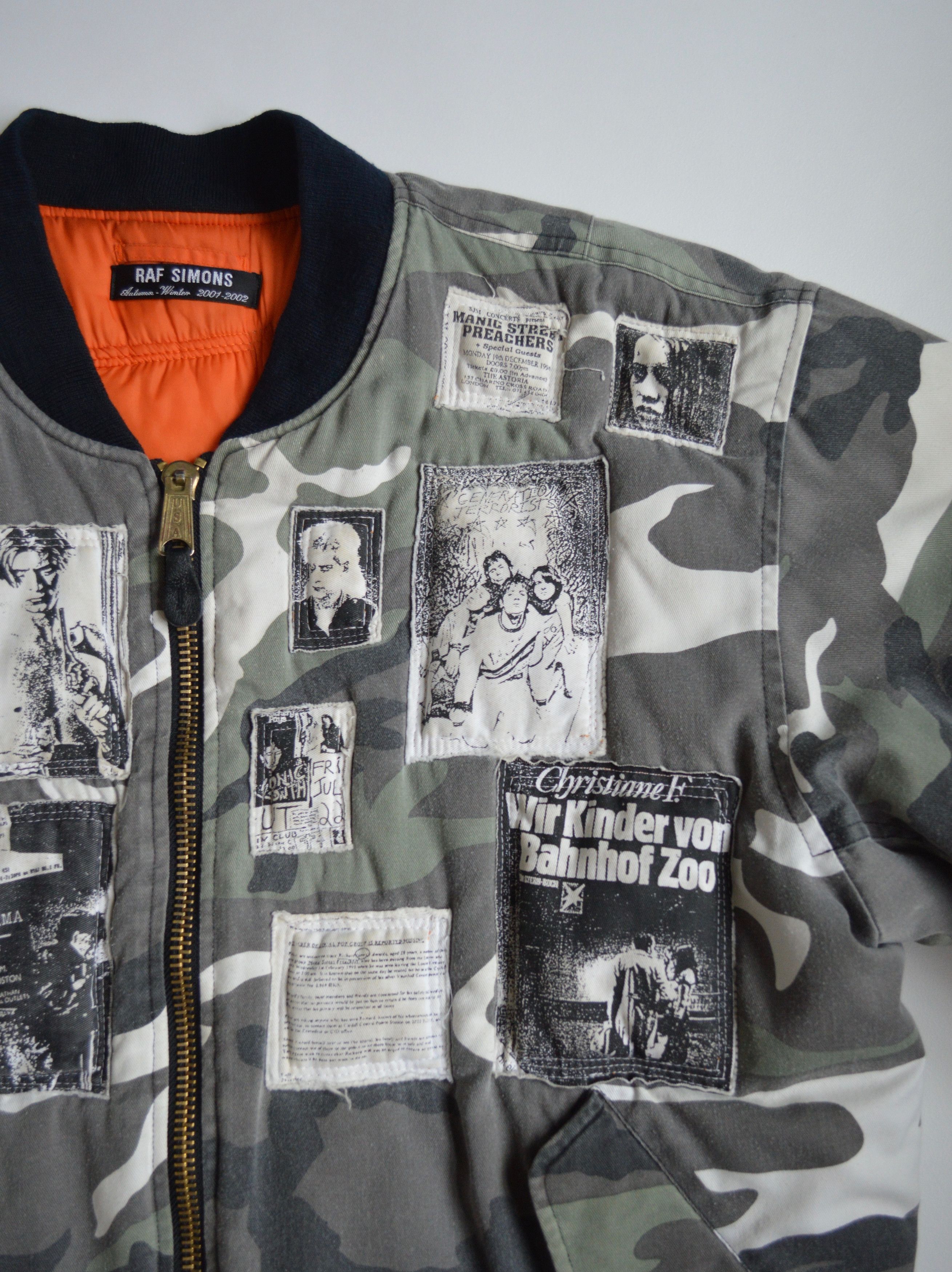 Raf Simons A/W 2001 'Riot Riot Riot' camo patch bomber jacket | Grailed
