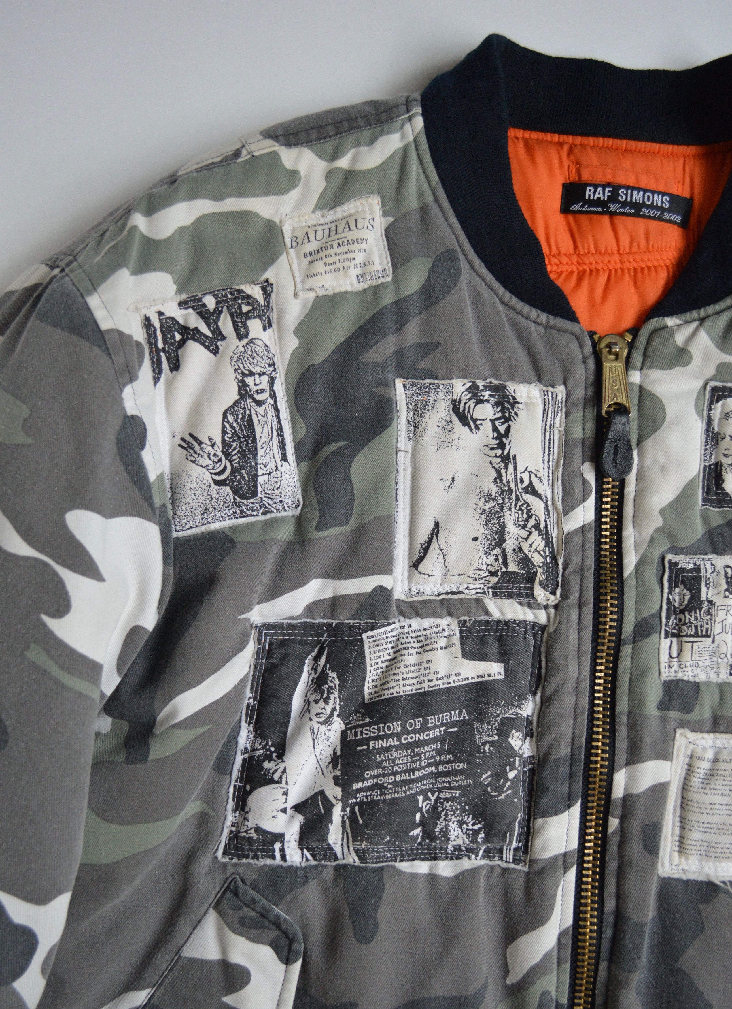 Raf Simons A/W 2001 'Riot Riot Riot' camo patch bomber jacket | Grailed