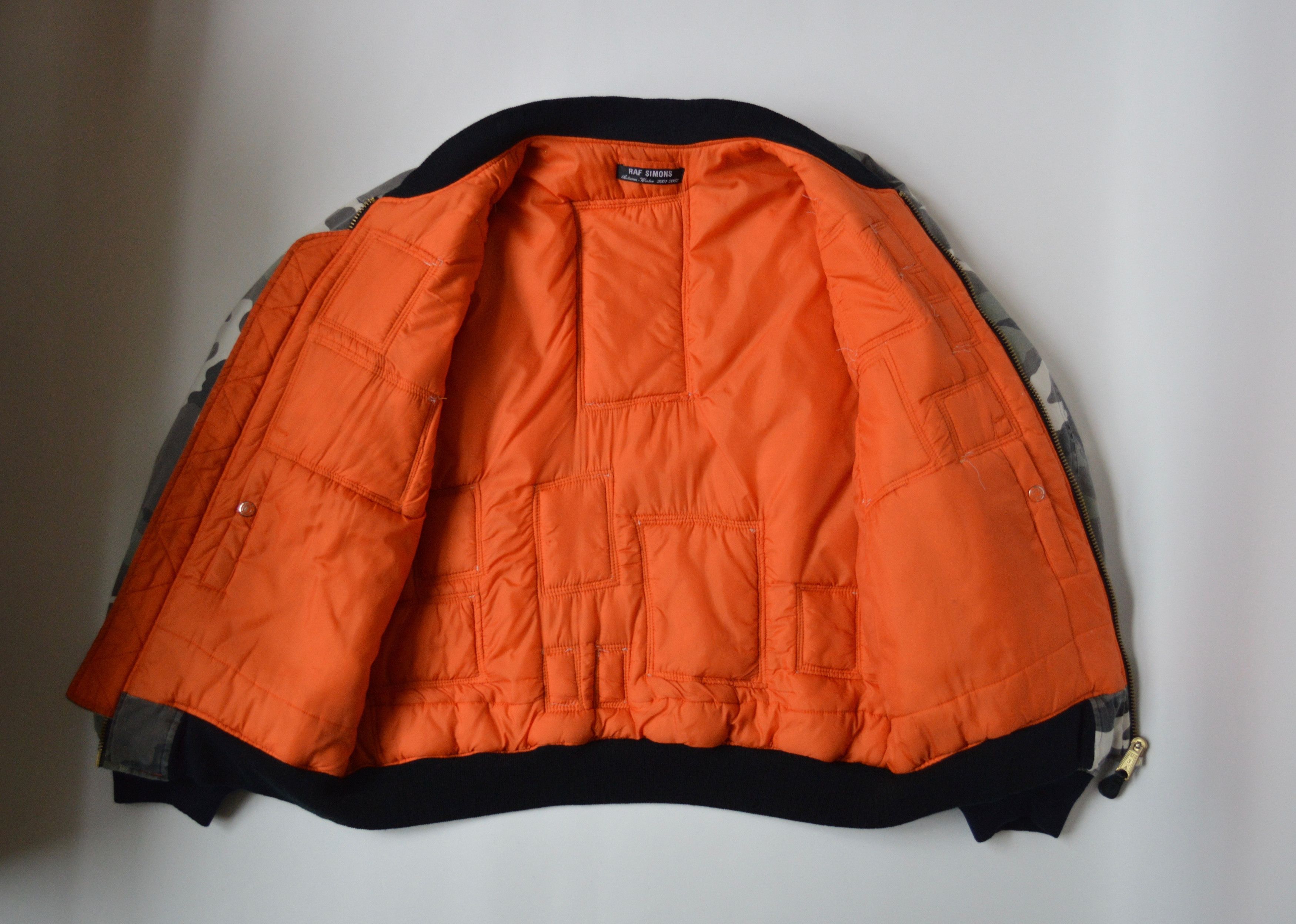 Raf Simons A/W 2001 'Riot Riot Riot' camo patch bomber jacket | Grailed